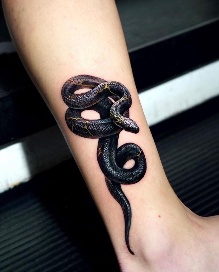 Sneaky Style: Unleashing the Power of The Snake Tattoo - tattoogenda.com