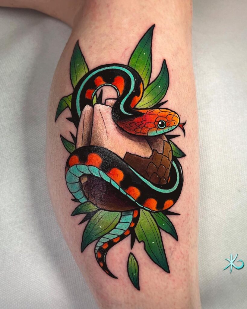 Sneaky Style: Unleashing the Power of The Snake Tattoo - tattoogenda.com